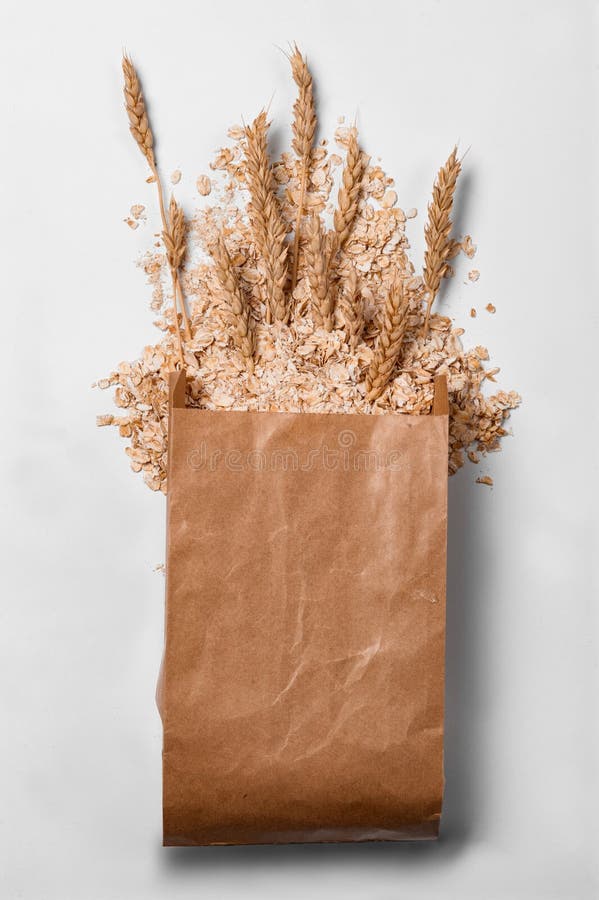 Oatmeal in Paper Bag on White Background Stock Image - Image of natural ...