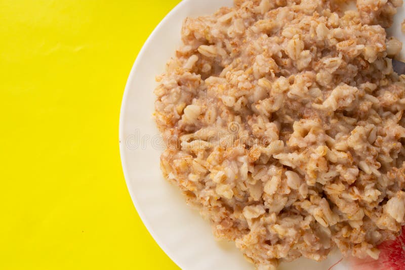 Oatmeal in a Plate on a Table in the Kitchen for Breakfast Stock Image ...