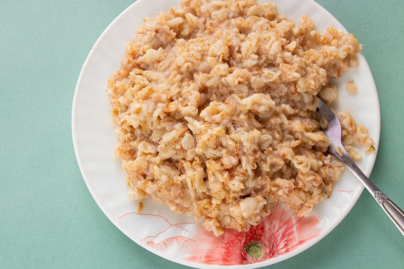 Oatmeal in a Plate on a Table in the Kitchen for Breakfast Stock Image ...