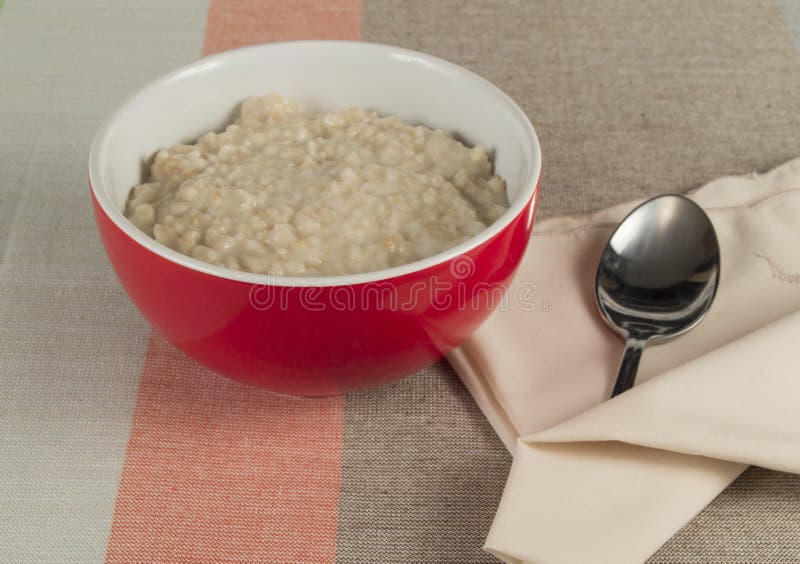 Oatmeal in a Red Bowl. the Concept of Healthy Breakfast Stock Image ...