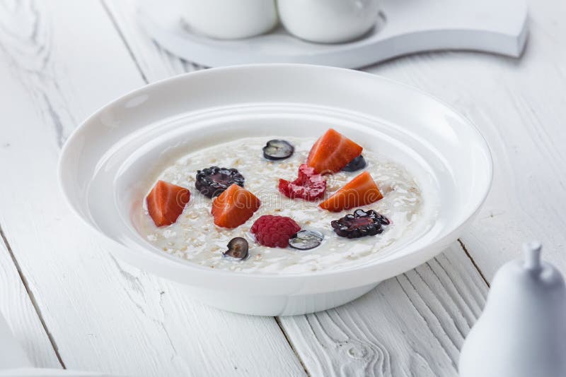 Oatmeal with Strawberry and Raspberry in a Bowl Stock Image - Image of ...