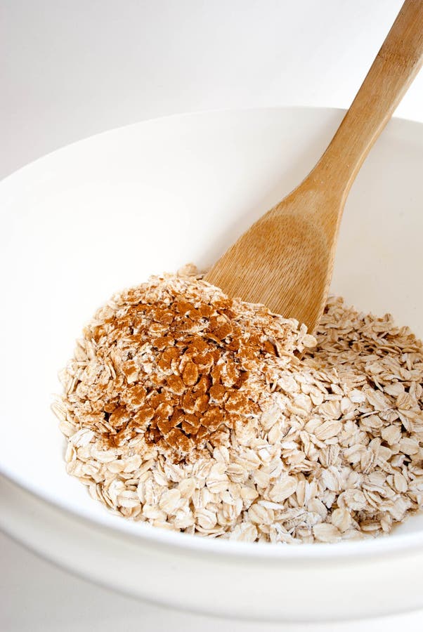 Oats and Cinnamon, Vertical Stock Photo - Image of white, spoon: 23734348