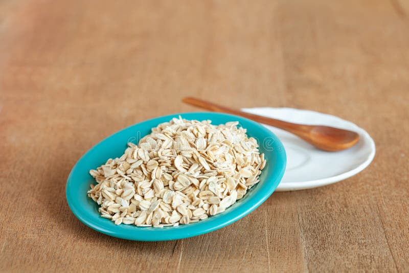 Oats Flakes in Dish on Table Stock Photo - Image of oats, meal: 140716750