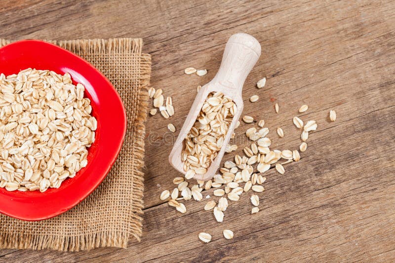 Oats in plate on wood stock photo. Image of diet, seed - 77333258