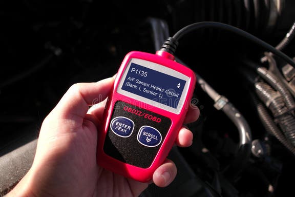OBD or OBD-II Scanner in Use by Technician , Automotive Diagnostic Tool in Use for Scanning ...