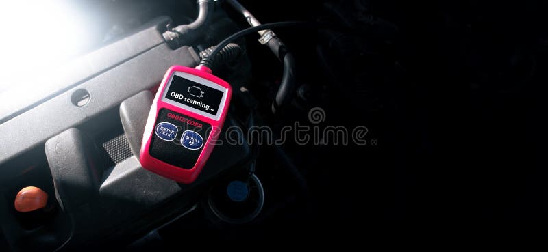OBD2 or OBD Scanner Tool on Car Engine Compartment for Engine System ...