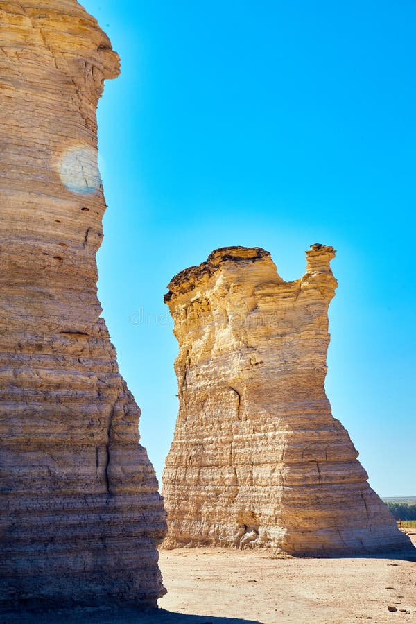 Obelisks of White Rock Sticking Out of Flat Desert Stock Photo - Image ...
