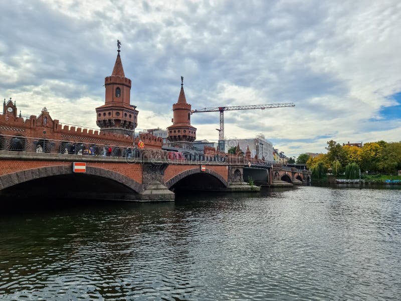 Oberbaum Bridge Crossing Spree River in Berlin with Construction Crane ...