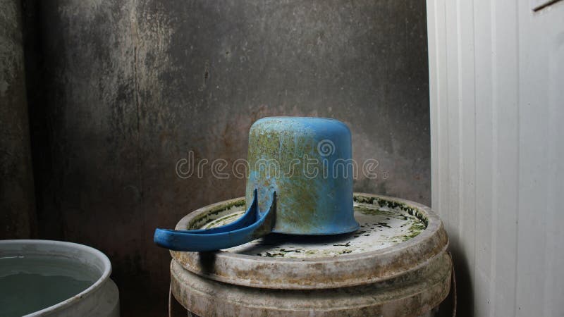 Object of a Blue Dipper Placed on Top of the Bathroom Stock Photo ...