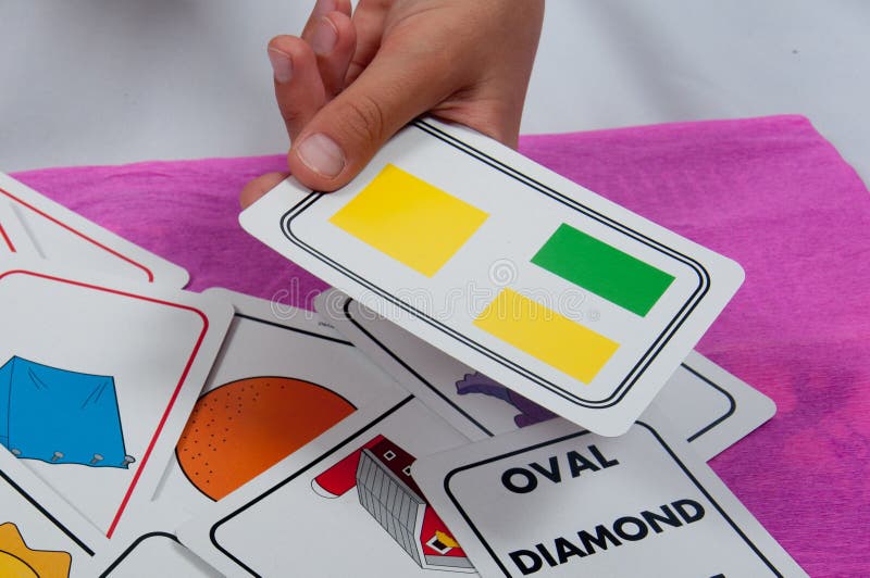 Object cards in hand stock image. Image of blue, orange - 58915177