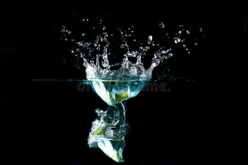 The Object Falls into the Blue Water until a Sponge Splits Beautifully ...