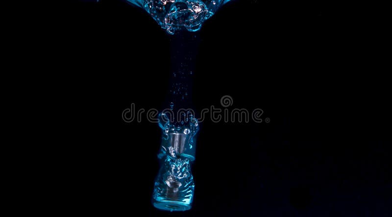 The Object Falls into the Blue Water Stock Photo - Image of liquid ...