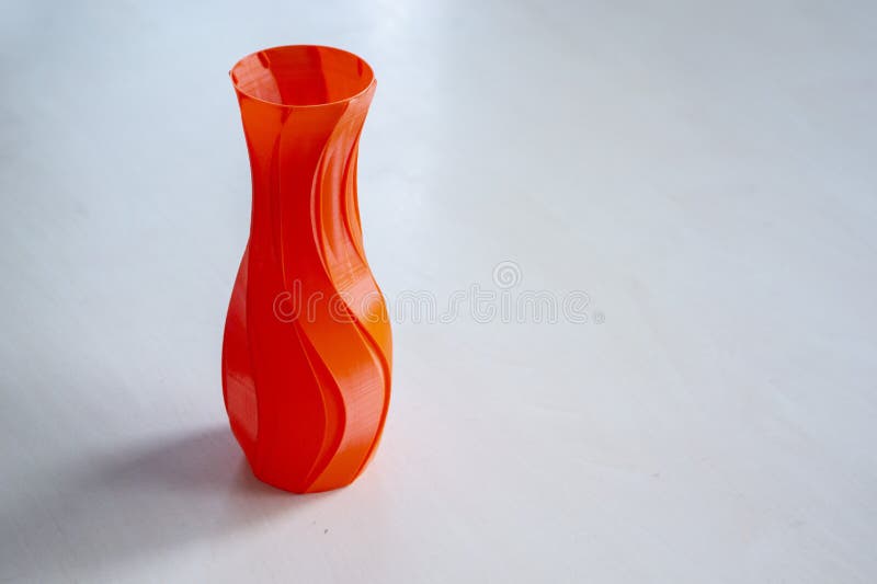 Object Form Vase of Red Color Printed on a 3D Printer. Three ...