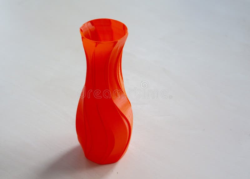 Object Form Vase of Red Color Printed on a 3D Printer. Three ...