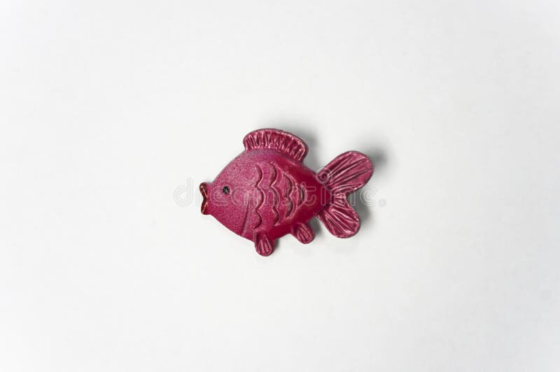 Fish on a Badge Attached To a Seat Stock Photo - Image of coastal, wood ...