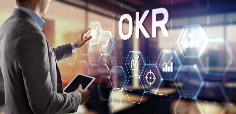 OKR, Objectives and Key Results Symbol. Businessman Turns Cubes with ...