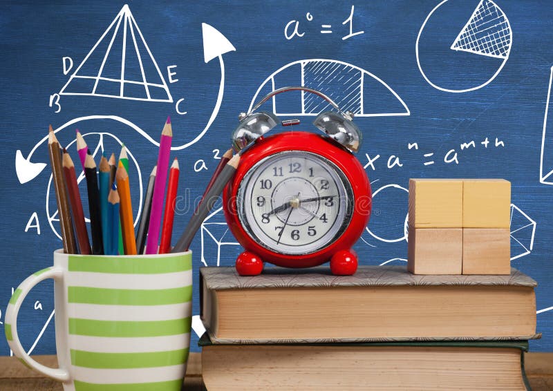 Objects on Desk Foreground with Blackboard Graphics of Math Equations ...