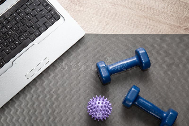 Objects for Fitness at Home and a Laptop for Remote Training. Stock ...