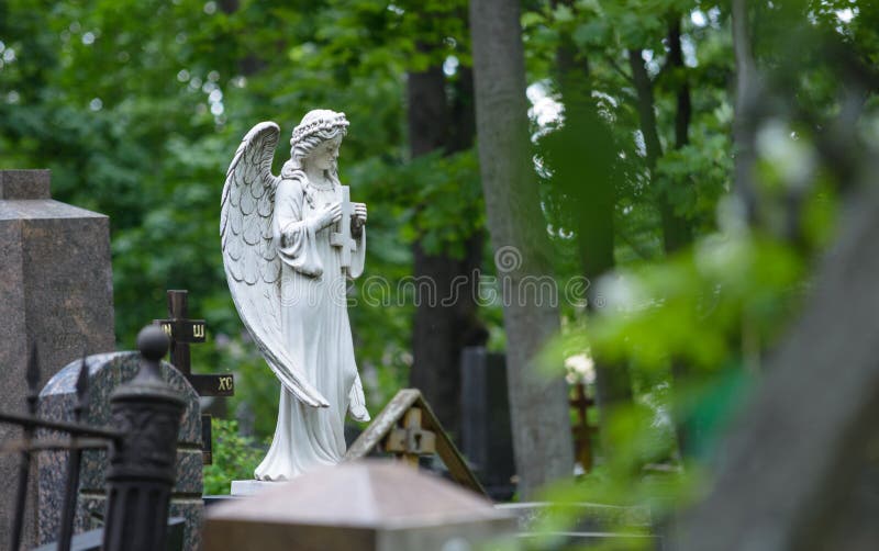 Grave Monument in the Cemetery, in the Summer, Surrounded by Green ...