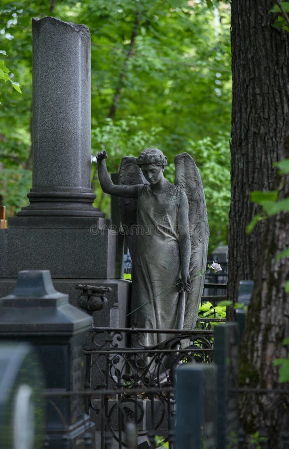 Grave Monument in the Cemetery, in the Summer, Surrounded by Green ...