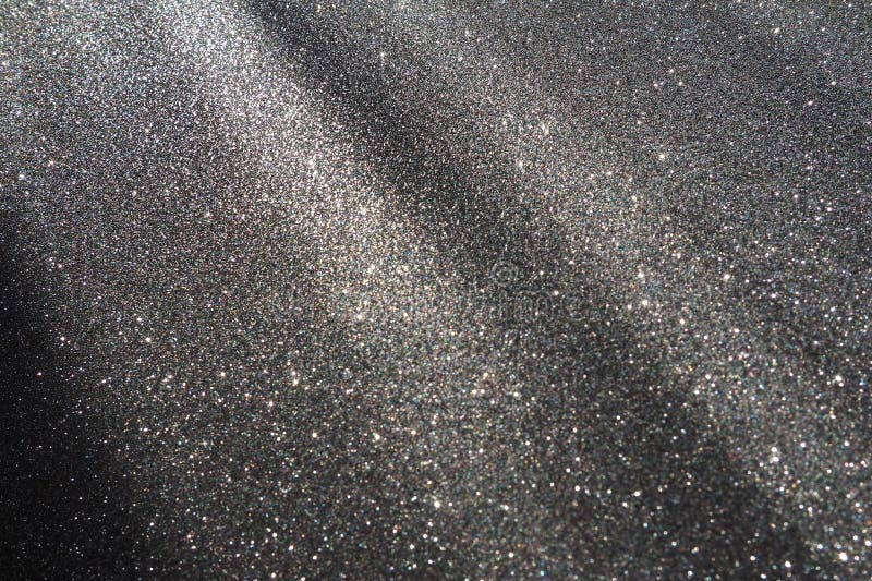 Oblique Rays of Light on a Black Surface. Bokeh, Dust Particles ...