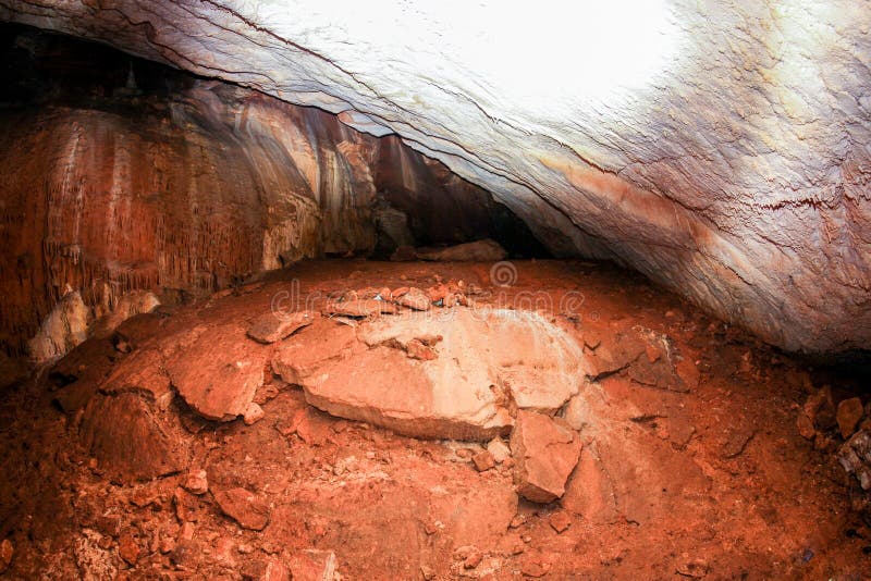 Oblique vault of the cave stock image. Image of orange - 217295913