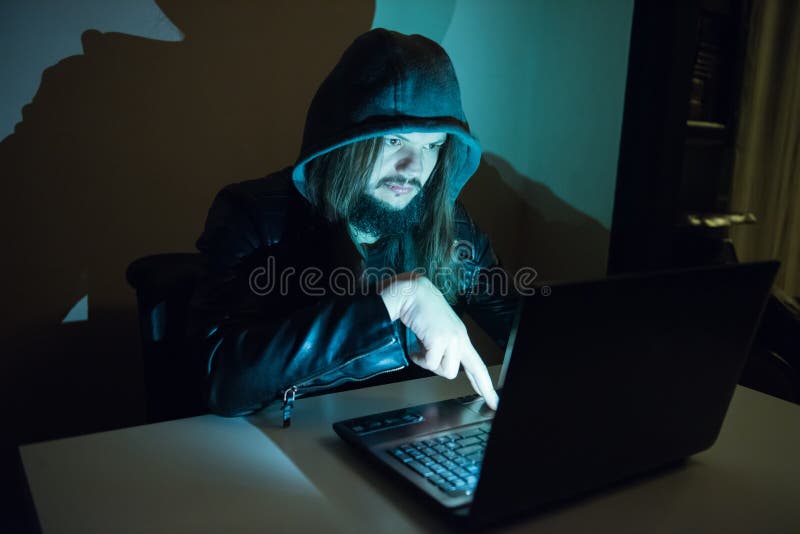 Obscure Criminal Man is Trying To Hack the System Stock Image - Image ...