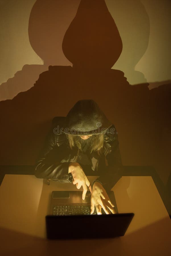 Obscure Criminal Man is Trying To Hack the System Stock Photo - Image ...