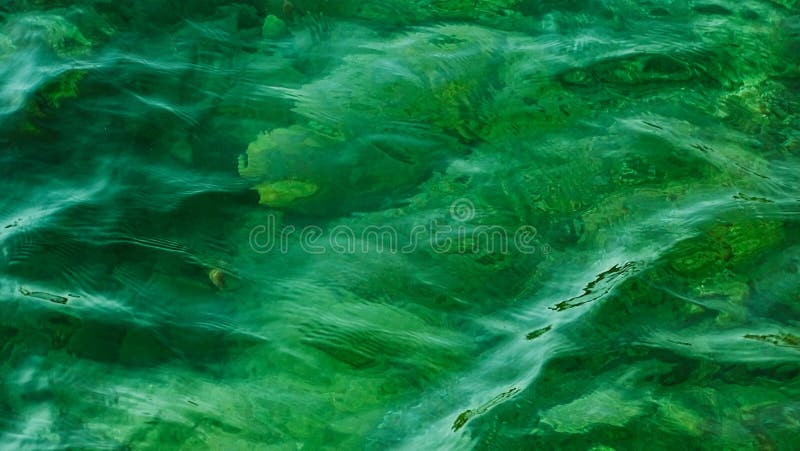 An Obscure Image of Rocks Below the Sea with a High Contrast Green ...