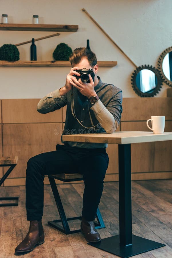 Obscured View of Man Taking Picture on Photo Camera Stock Image - Image ...