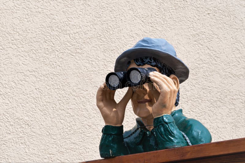 An Observer with a Binoculars is Looking into the Distance Stock Image ...