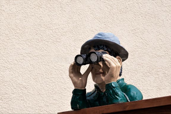 An Observer is Watching Something in the Distance Using His Binoculars ...