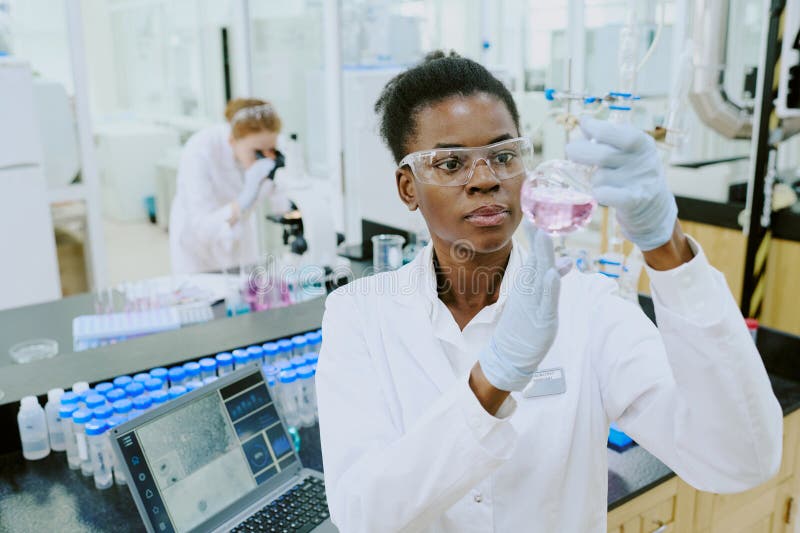 Observing Chemical Reaction in Modern Laboratory Setting Stock Photo ...