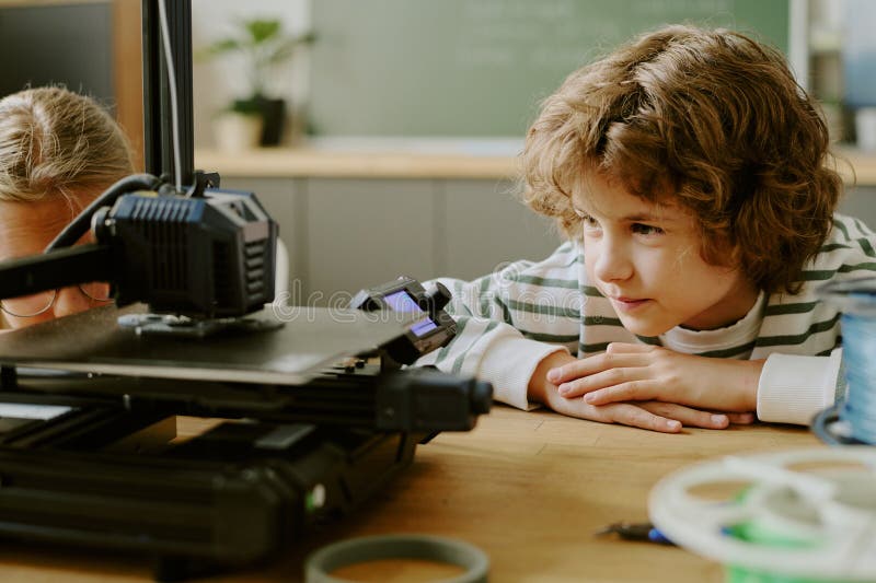 Observing 3D Printing Process with Focus and Curiosity Stock Photo ...