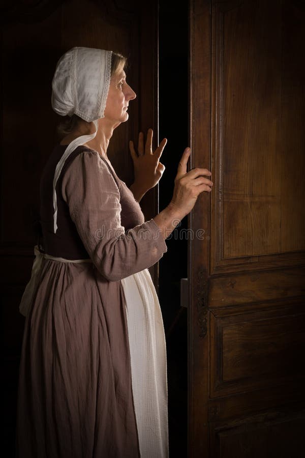 Observing through the door stock photo. Image of people - 212595058