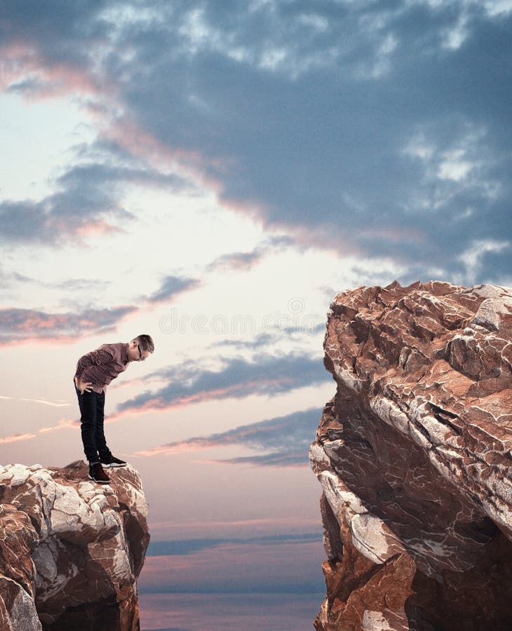 Kid Looking Up Over a Gap between Two Mountain Peaks Stock Image ...