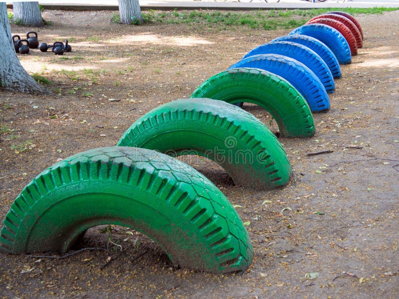 Obstacle Course of Old Car Tires Dug into the Ground Stock Image ...