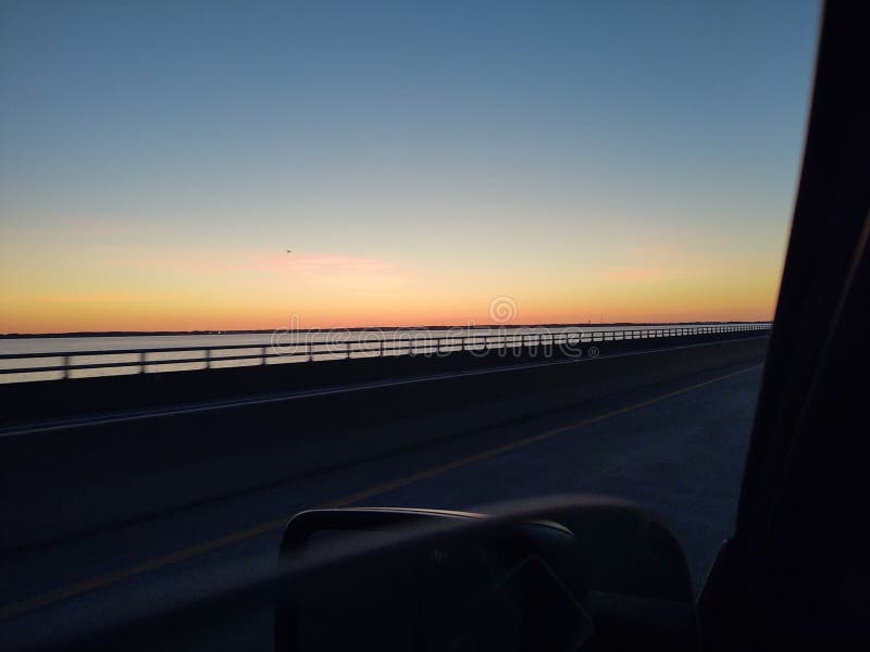 OBX bridge at sunrise stock photo. Image of ocean, afterglow - 189579652