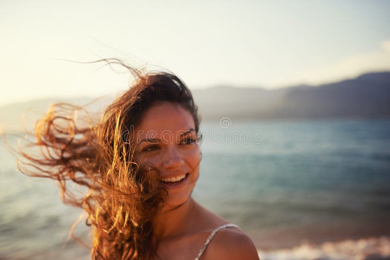Ocean Air. a Beautiful Young Woman on the Beach. Stock Photo - Image of ...