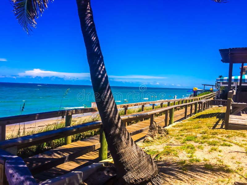 Ocean boardwalk in Florida stock image. Image of sand - 111971035