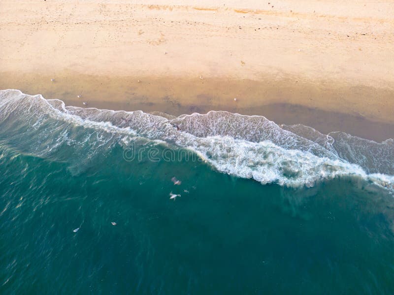 Ocean and Beach Sand Seen from Overhead View with Tide and Waves Stock ...