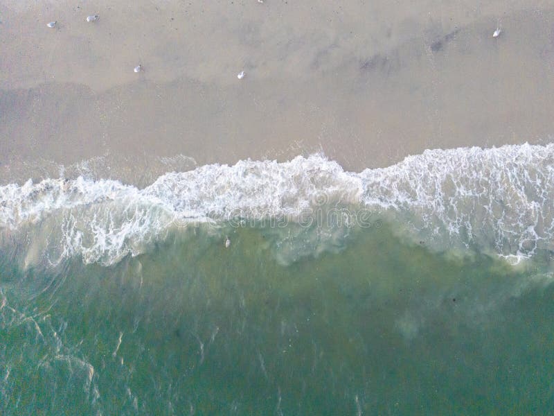 Ocean and Beach Sand Seen from Overhead View with Tide and Waves Stock ...