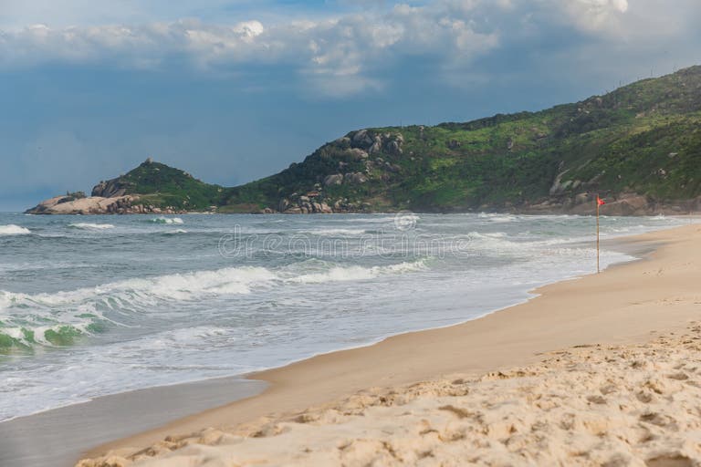 Ocean Beach with Sun Light before an Oncoming Storm. Mole Beach in ...
