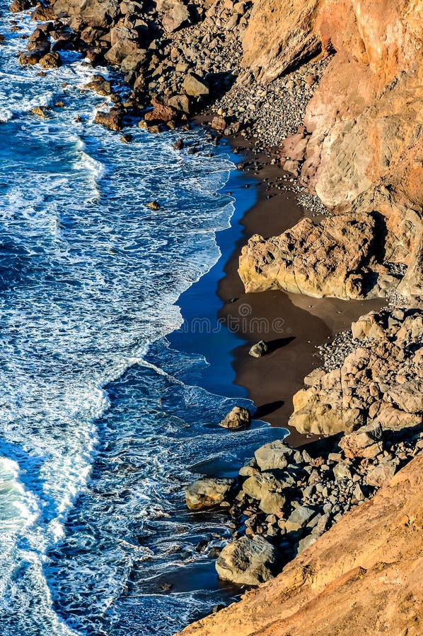 The Ocean is Calm and the Rocks are Jagged Stock Photo - Image of water ...
