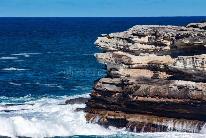 Oceanside Rocky Cliff Top Sandstone Wave Ridges with Blue Coastal Sea ...