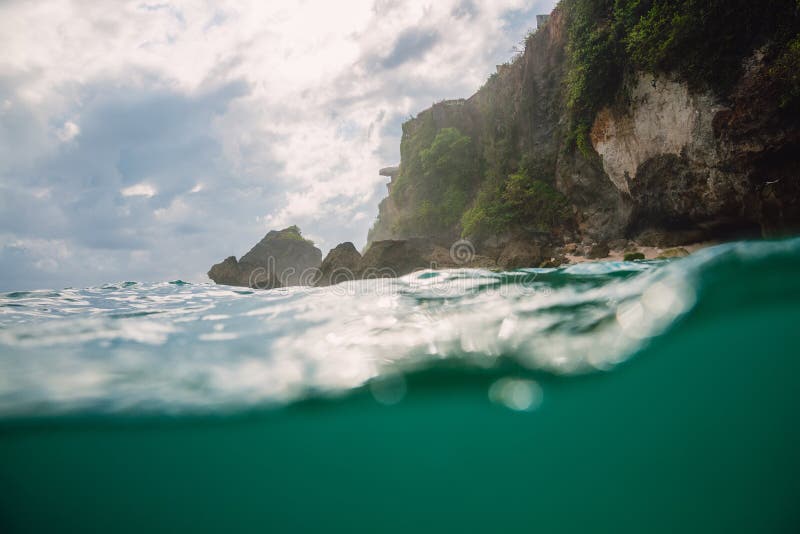 Ocean and Cliff in Uluwatu, Bali and Sunshine Stock Image - Image of ...