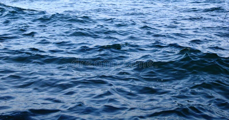 Ocean surface at nightfall stock photo. Image of wallpaper - 177357770