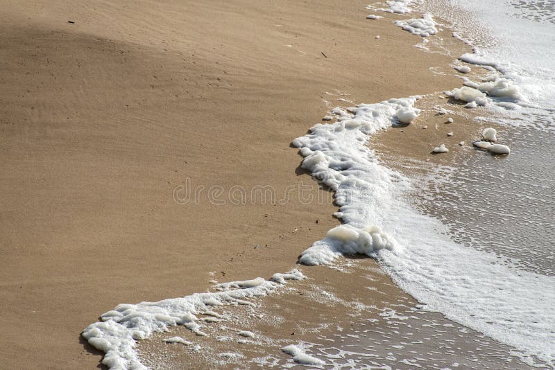 Ocean Foam from Waves in the Beach Sand Stock Image - Image of geology ...
