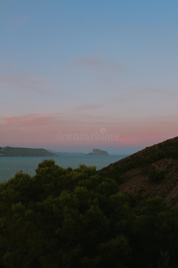 Ocean Gleaming Under the Pink Cloudy Sky Stock Image - Image of clouds ...