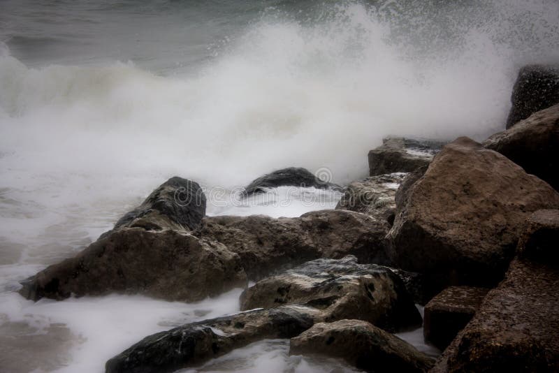 Ocean Hitting Rocks with Strengh Stock Photo - Image of leaves, waves ...